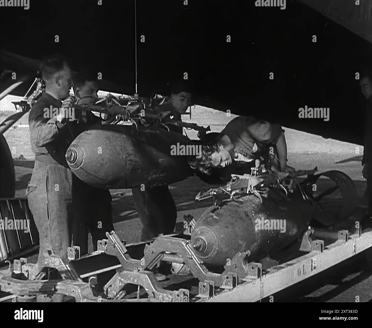 RAF Ground Crew Members Fixing Bombs to an Avro Lancaster Bomber, 1942 ...