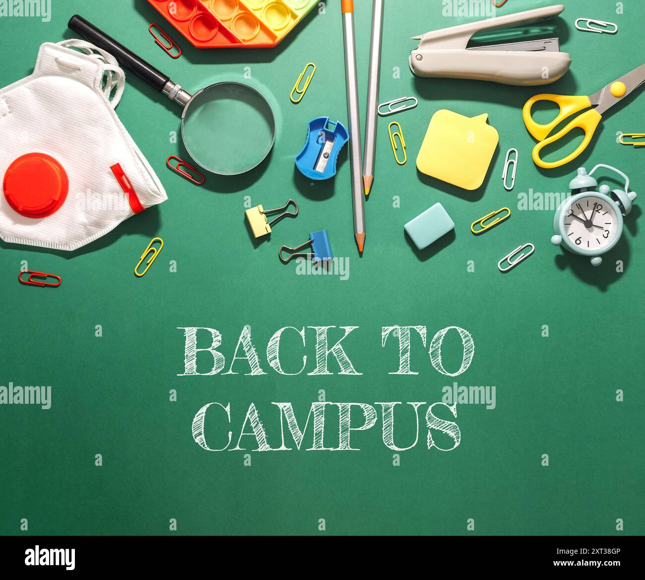 Back to campus is written on a green background Stock Photo - Alamy