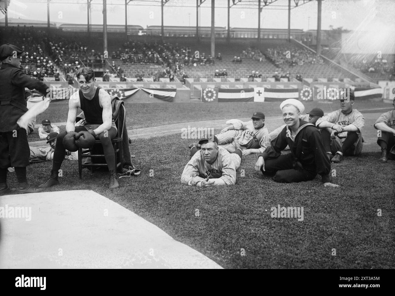 Boxer Joe Welling, amid Cleveland baseball players in stadium, 1918 ...
