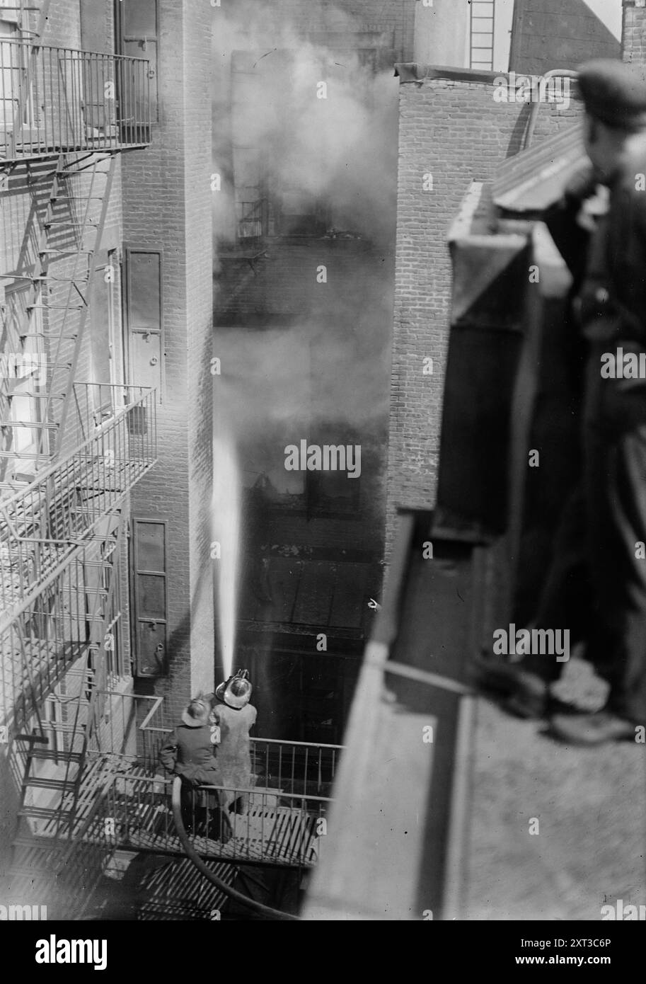 Firefighters scene fire Black and White Stock Photos & Images - Alamy