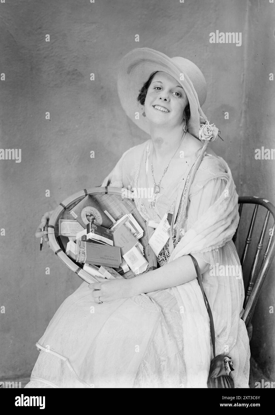 Estelle Thomas, 1917. Shows actress Estelle Thomas selling cigarettes ...