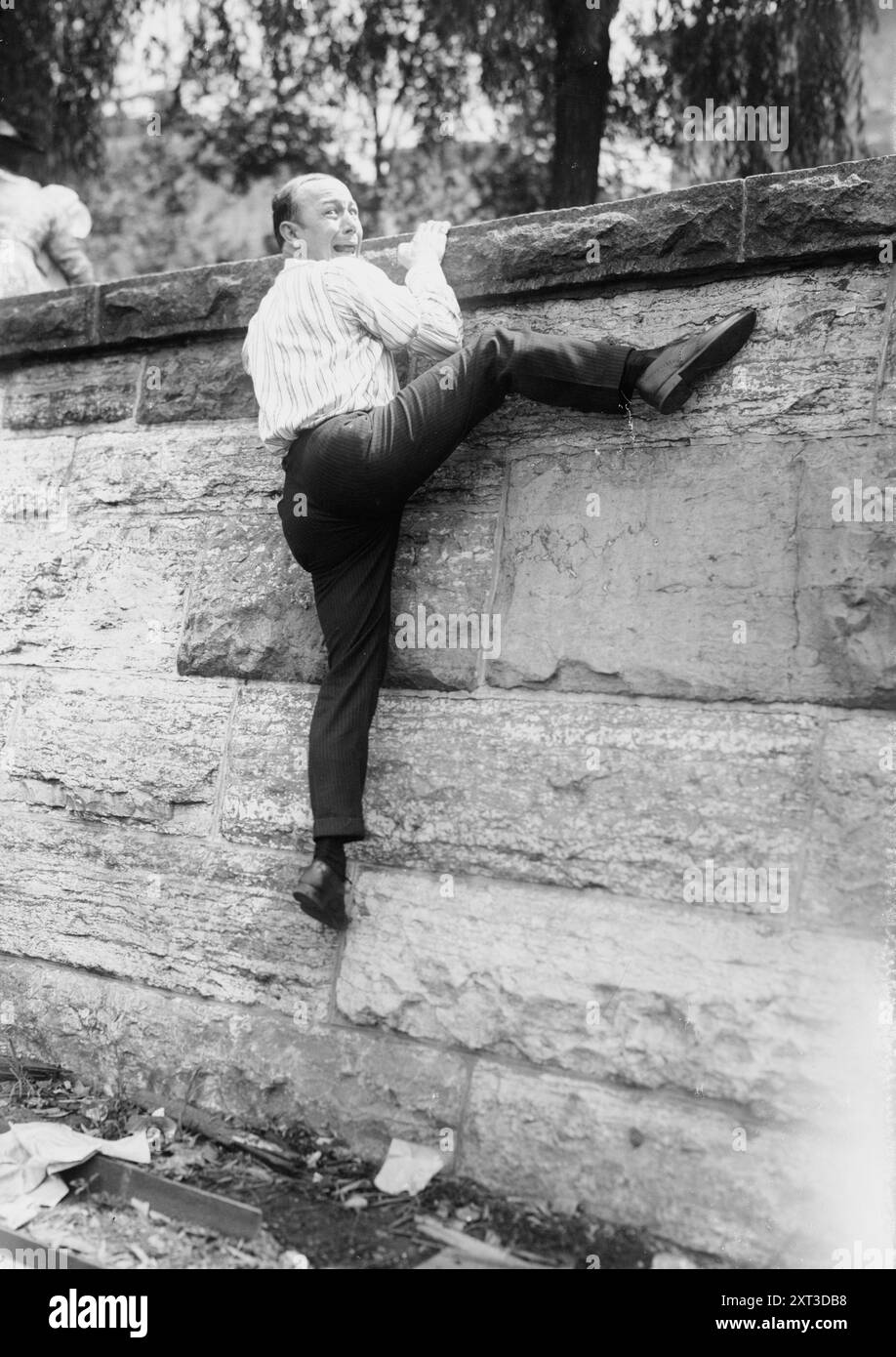 Person climbing glass wall Black and White Stock Photos & Images - Alamy
