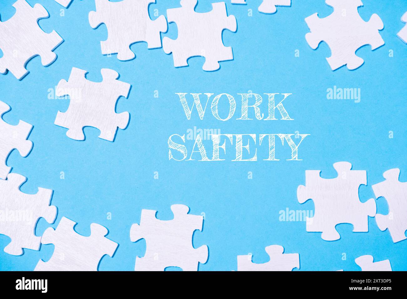 A jigsaw puzzle with the words work safety written on it Stock Photo ...