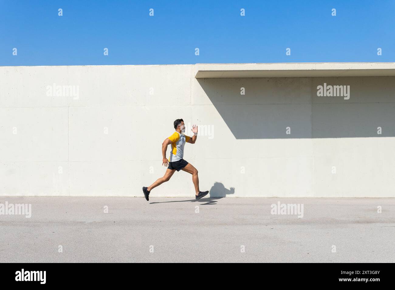 Indian man running hi-res stock photography and images - Alamy
