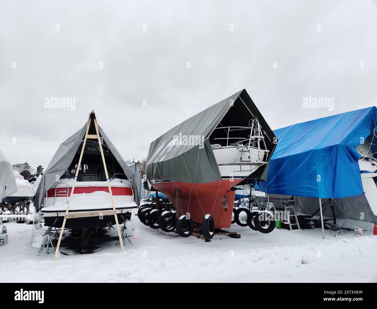 Sailboats are covered. protected and stored out of the water for the ...