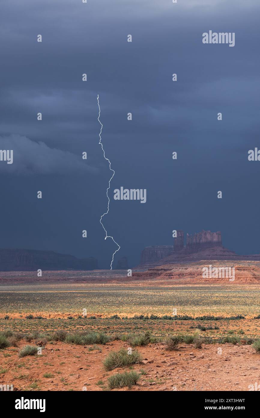 A striking lightning bolt cuts through a stormy sky above the iconic ...