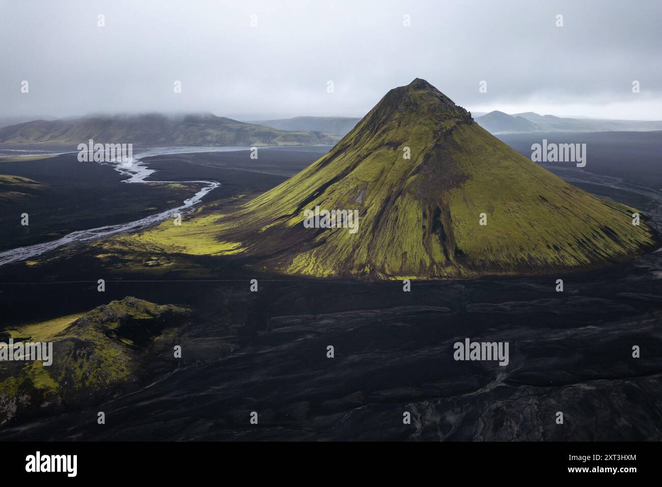 A stunning aerial view showcasing Maelifell Volcano, characterized by ...