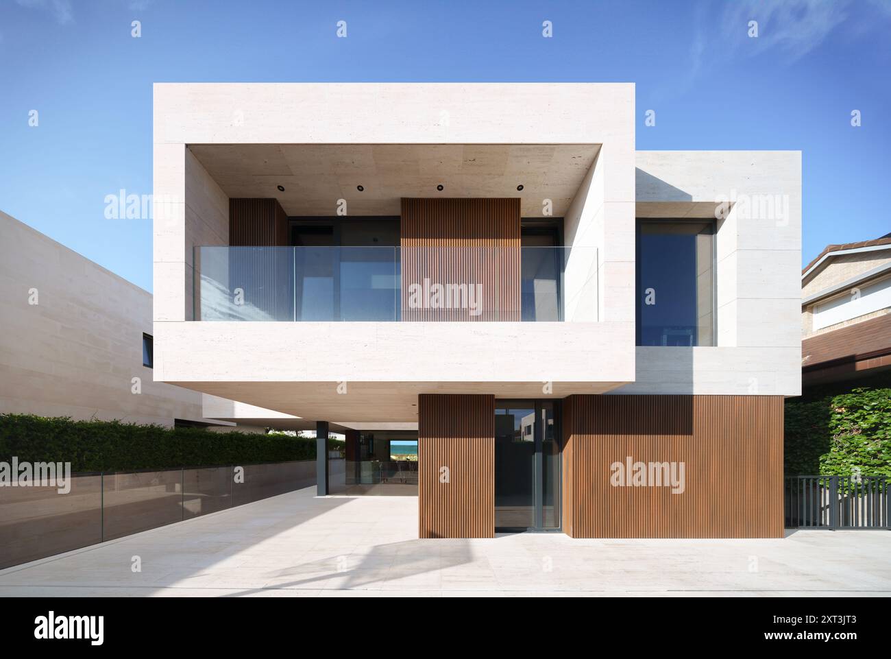 This image showcases a contemporary house with a striking modern ...