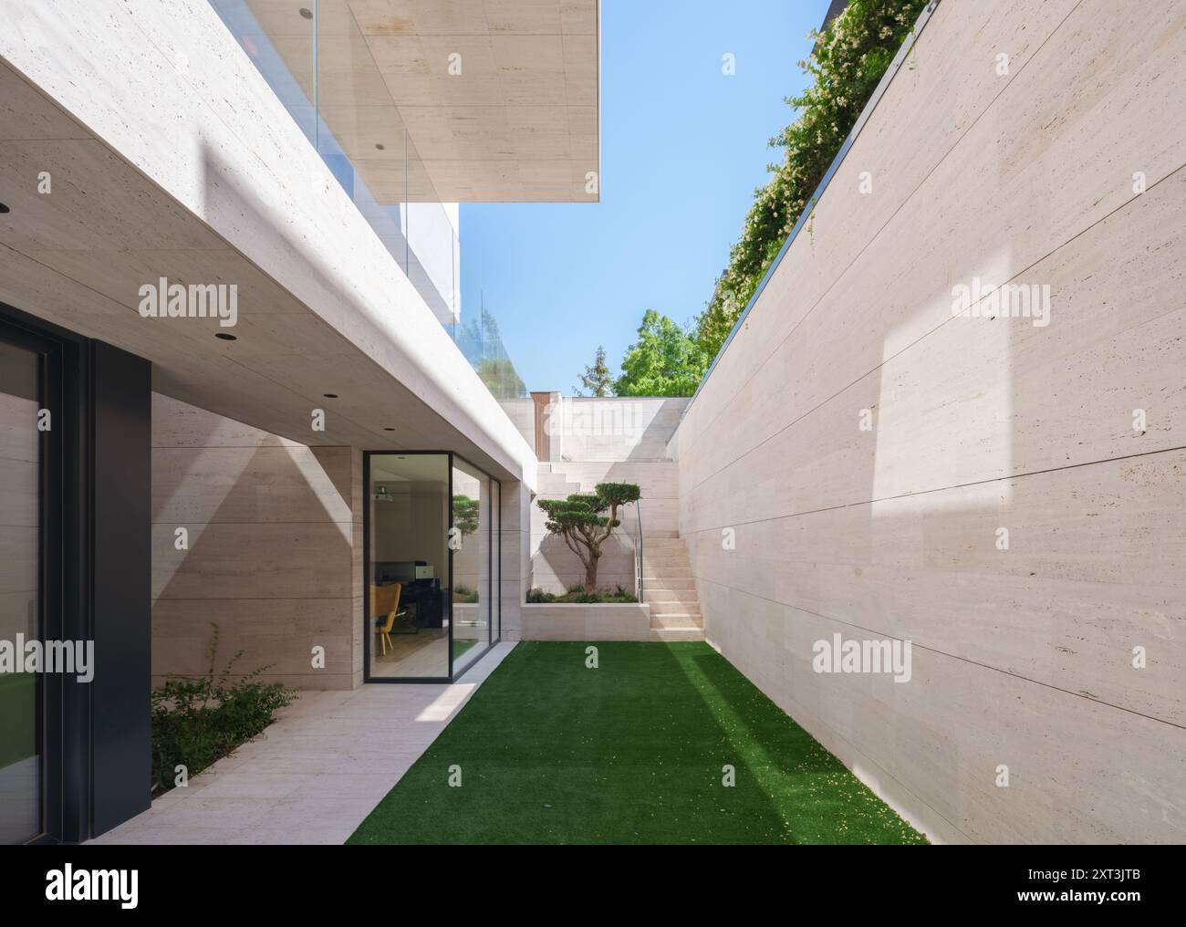 A stunning example of 21st-century architecture, featuring a minimalist ...