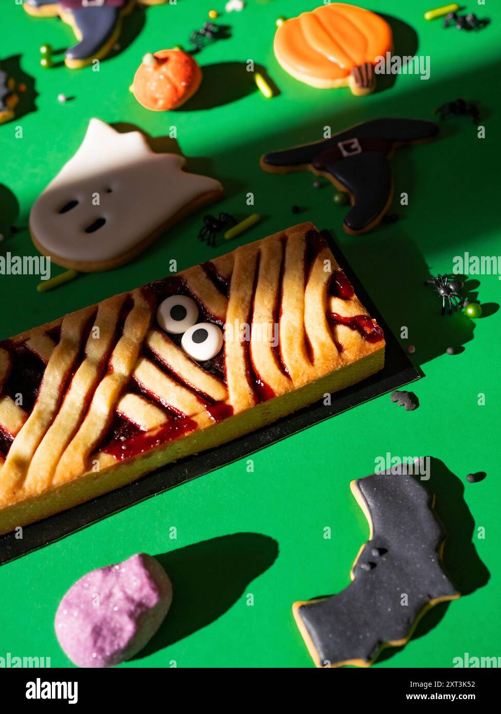 A selection of homemade Halloween cookies in spooky shapes and a large ...