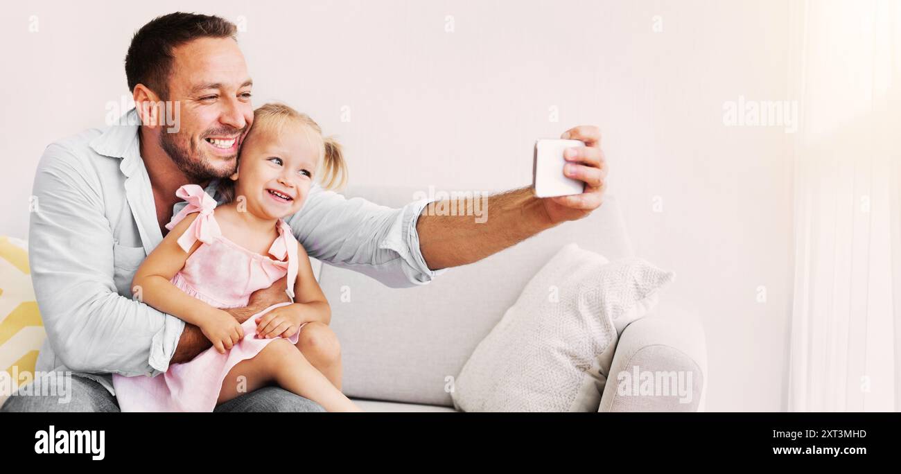 Smiling dad and little girl taking selfie Stock Photo - Alamy