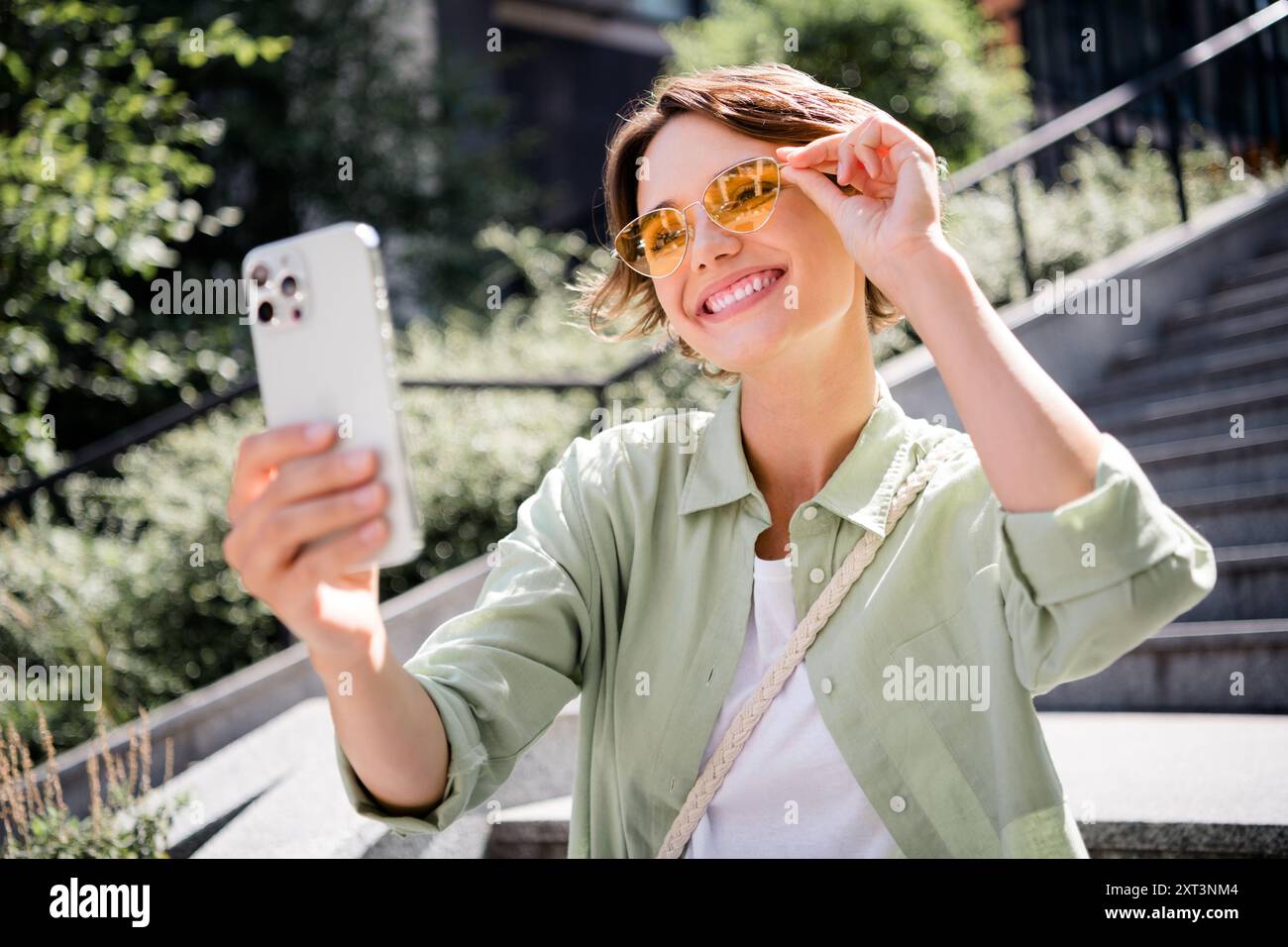 Photo of charming cheerful lovely girl popular influencer making selfie ...