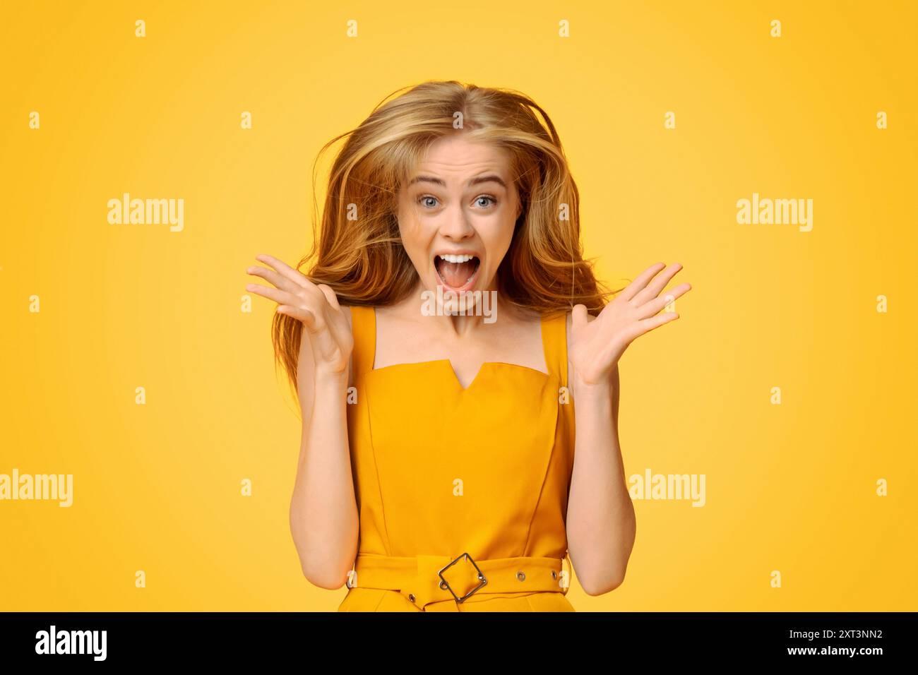 Excited Teen Girl Screaming With Joy Over Yellow Background, Raising ...