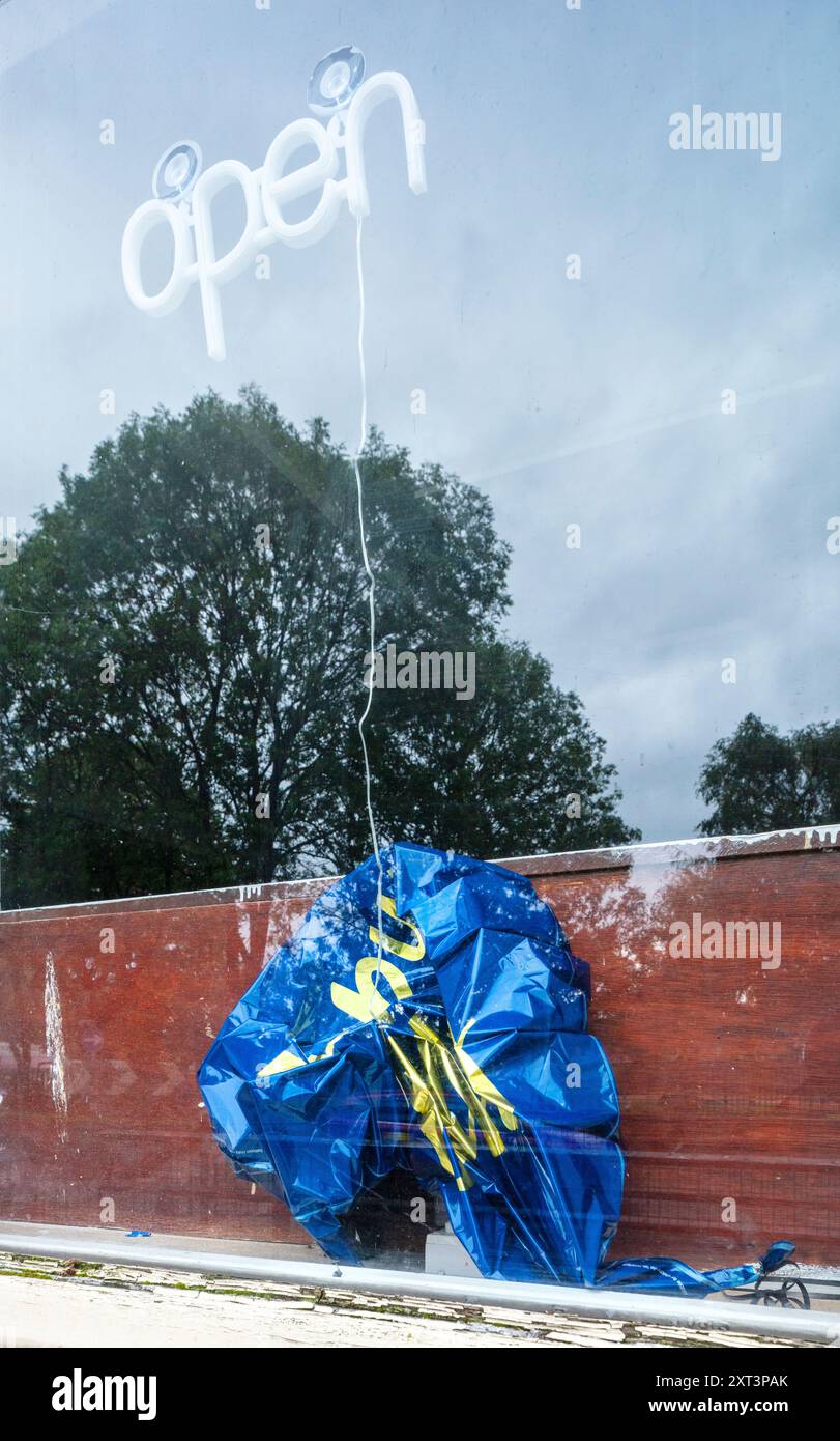 Market Place, Middleton, Rochdale, 2023. Detail of the window of a ...
