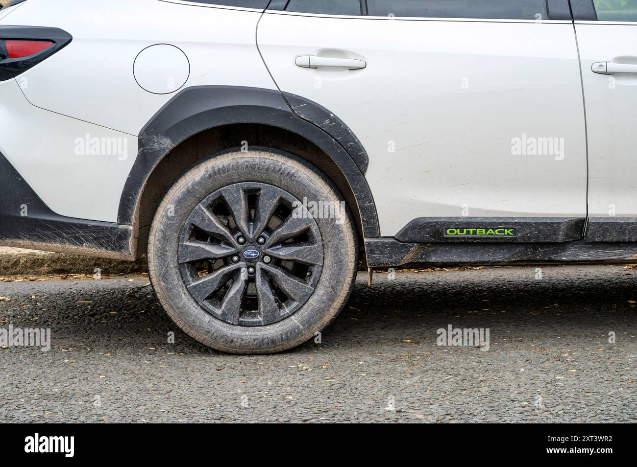 Detail of a dirty Subaru Outback car wheel, UK, Europe Stock Photo - Alamy