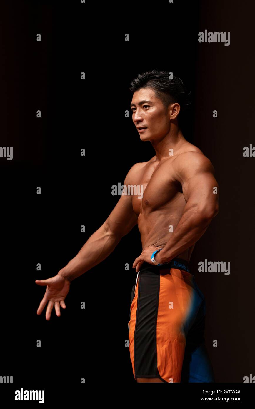 Ak? Y?ma poses during Men's Physique competition at ANNBBF's 1st Kanto ...