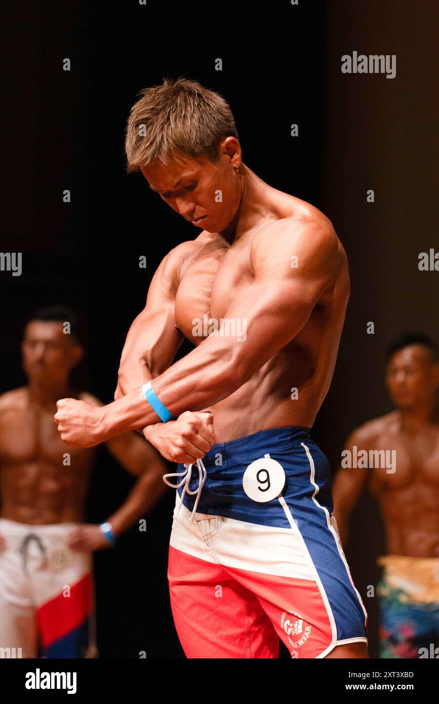 Takahashi Akihiro poses during Men's Physique competition at ANNBBF's ...