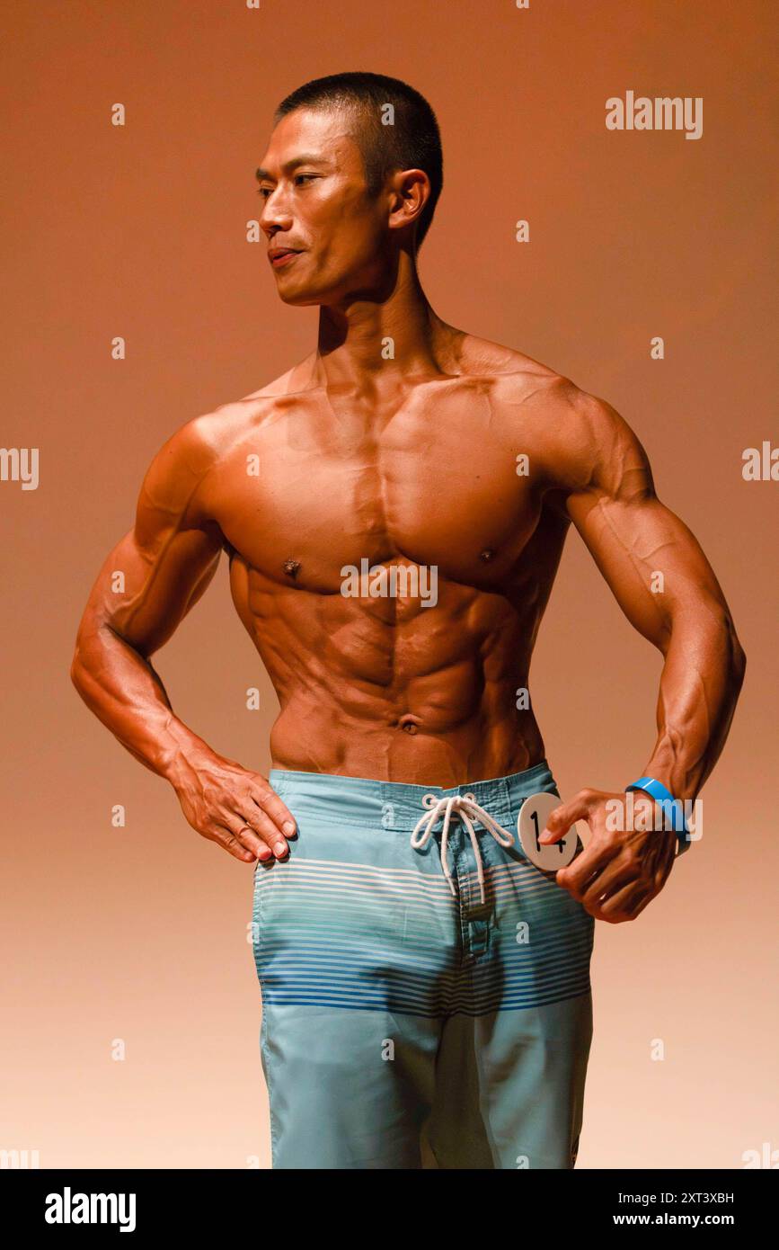 Nakamura Takuya poses during Men's Physique competition at ANNBBF's 1st ...