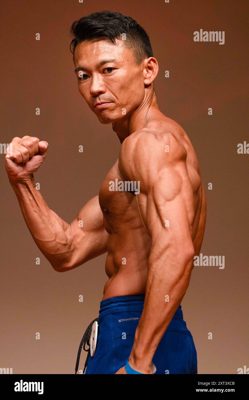 Ozawa Takaya poses during Men's Physique competition at ANNBBF's 1st ...