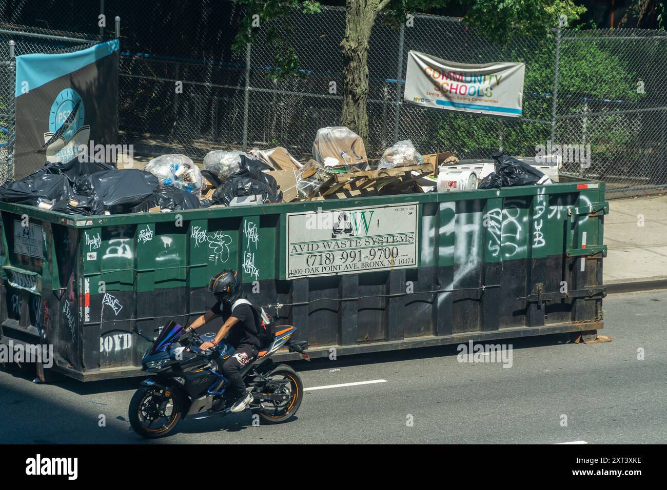 A dumpster in Chelsea in New York filled with detritus from a school ...
