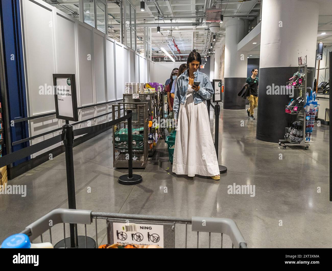 Check-out line in a Whole Foods Market supermarket in New York on ...