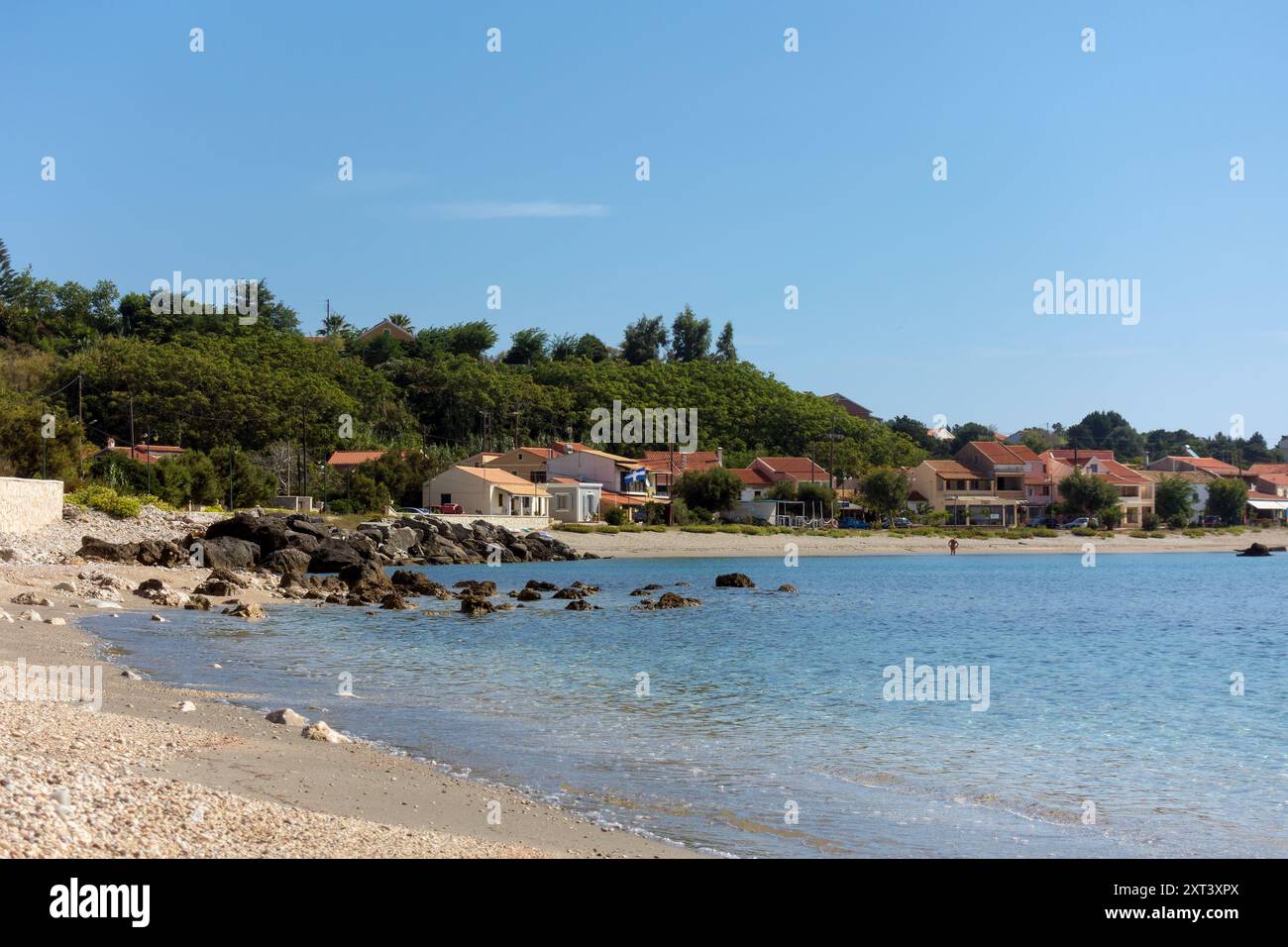 The seaside main harbor village in Othonoi island, Greece, with its ...