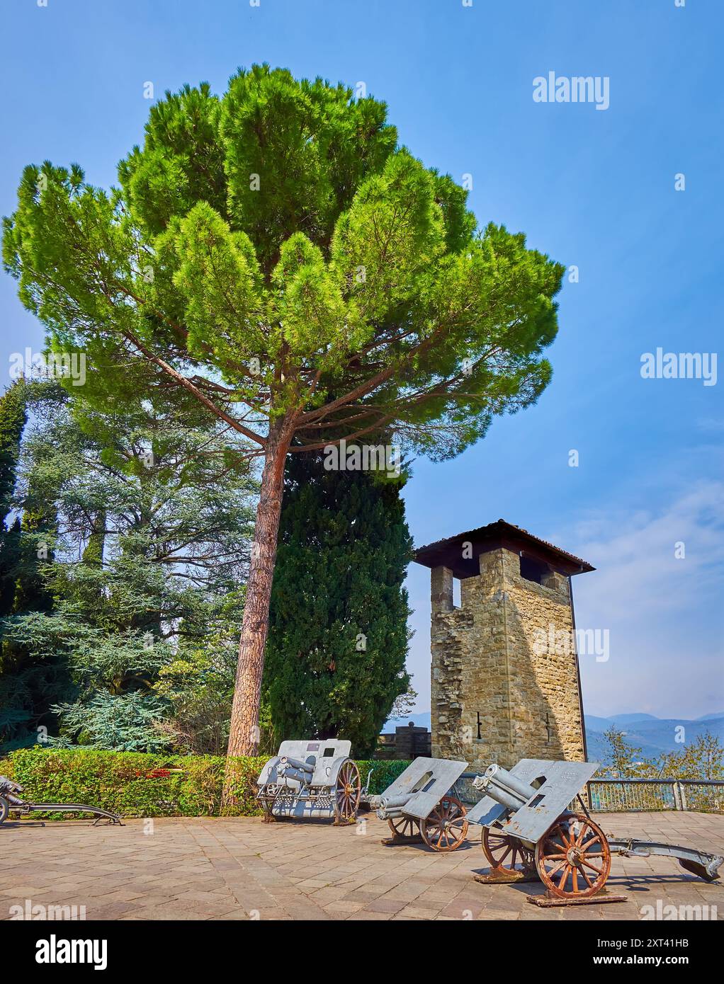 The viewing terrace with vintage cannons, medieval watchtower and lush ...