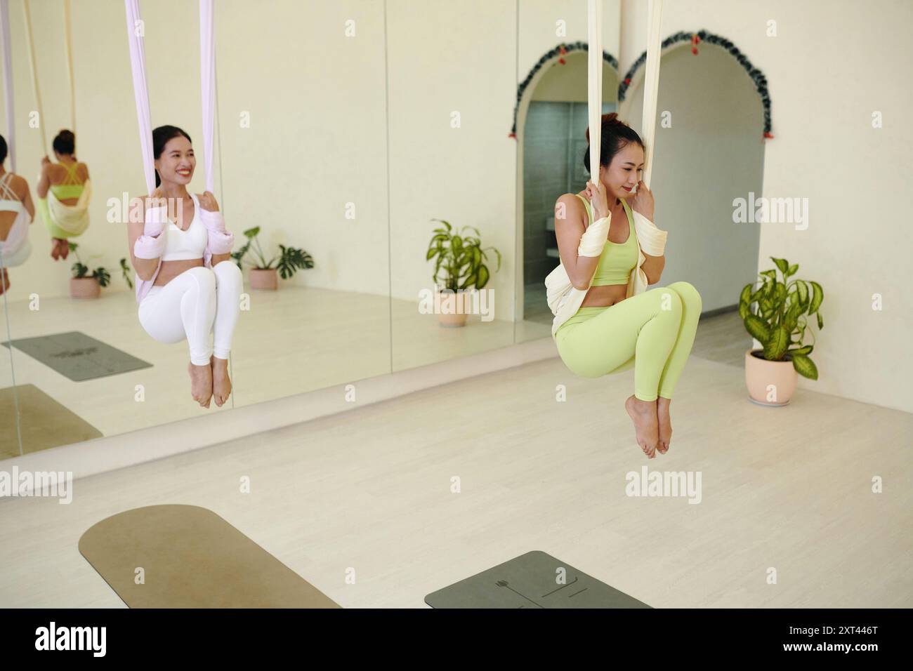 Aerial yoga hammock studio hi-res stock photography and images - Alamy