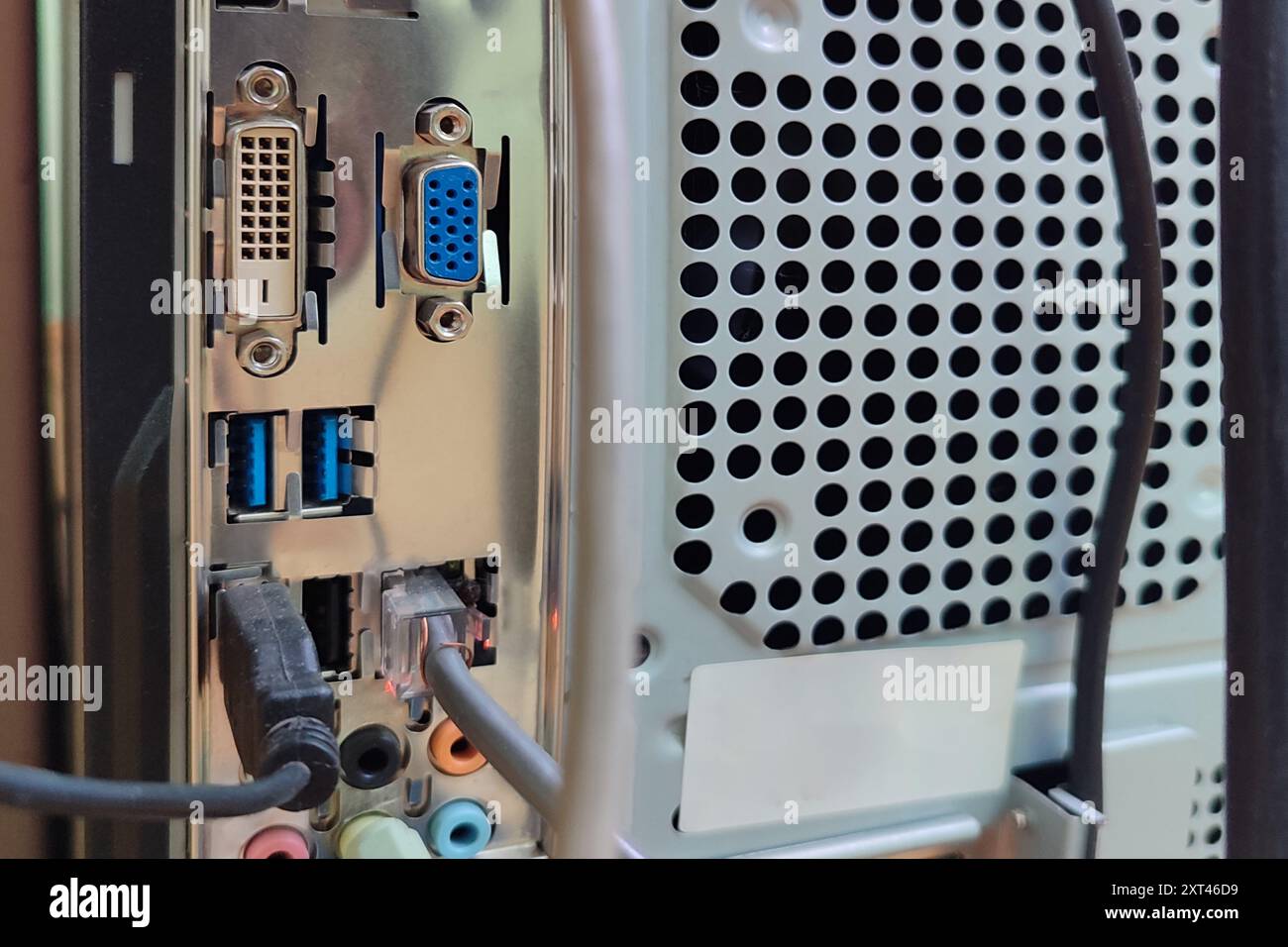 Computer system unit, rear view. The motherboard connectors, power ...