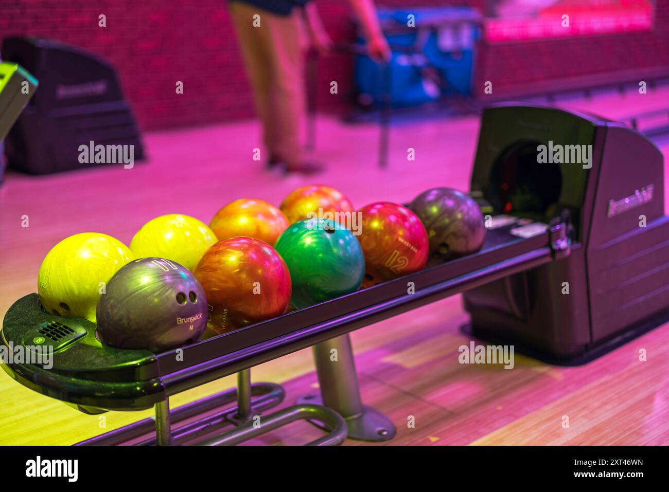 Close up view of automatic ball return system in bowling alley ...