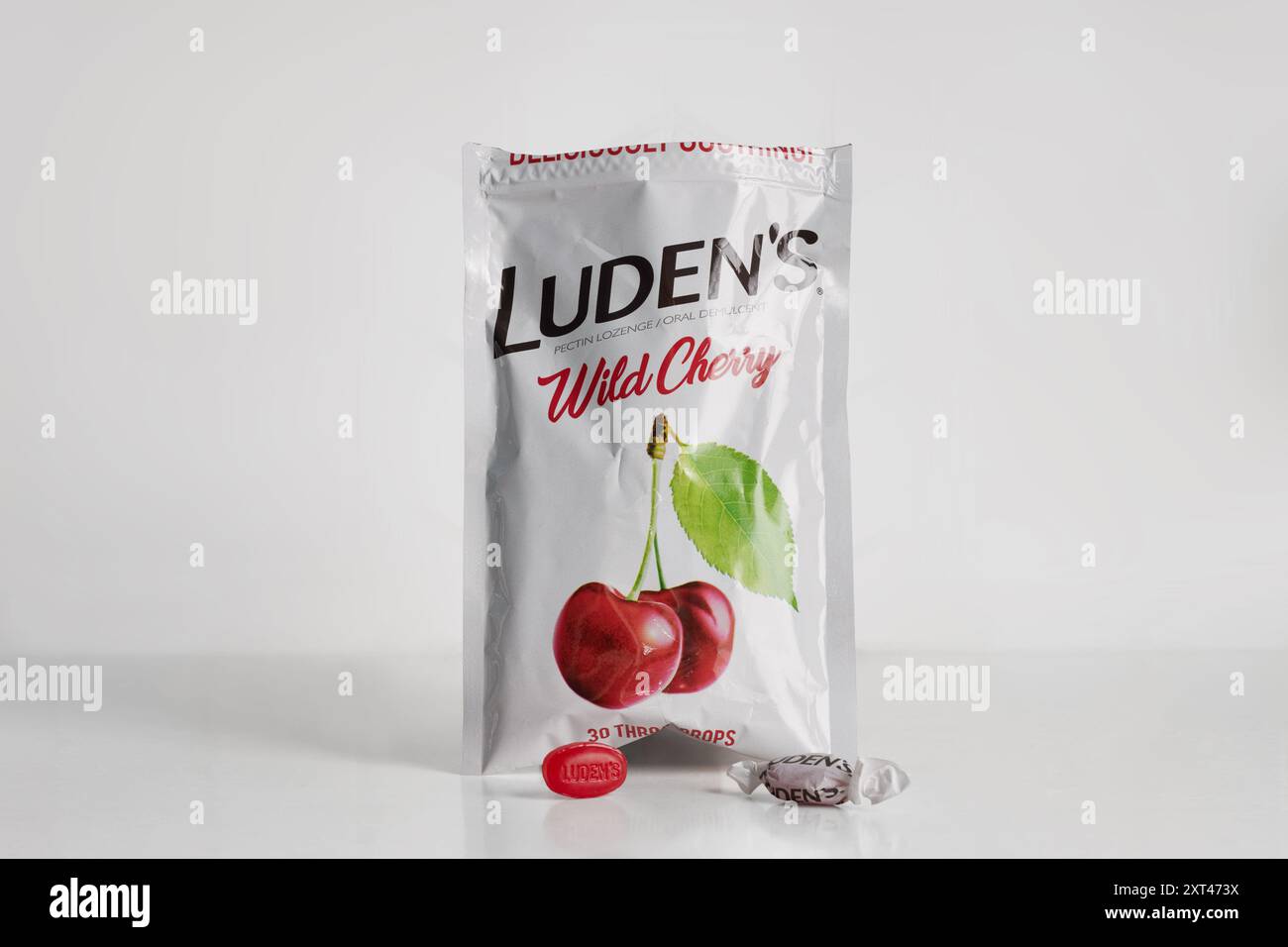bag of wild cherry flavored Luden's cough drops with individual throat ...