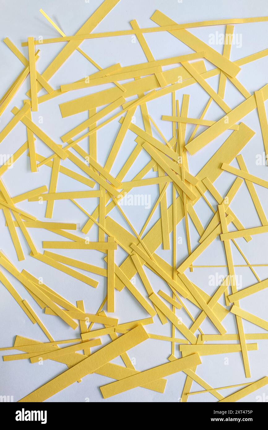 Yellow paper cuttings. Yellow paper cuttings. Yellow paper on white ...