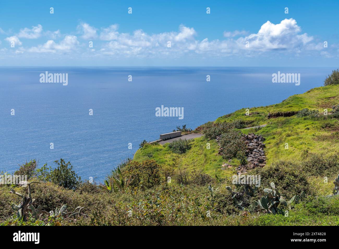 View of the ocean from a hill above the town of Calheta on the island ...