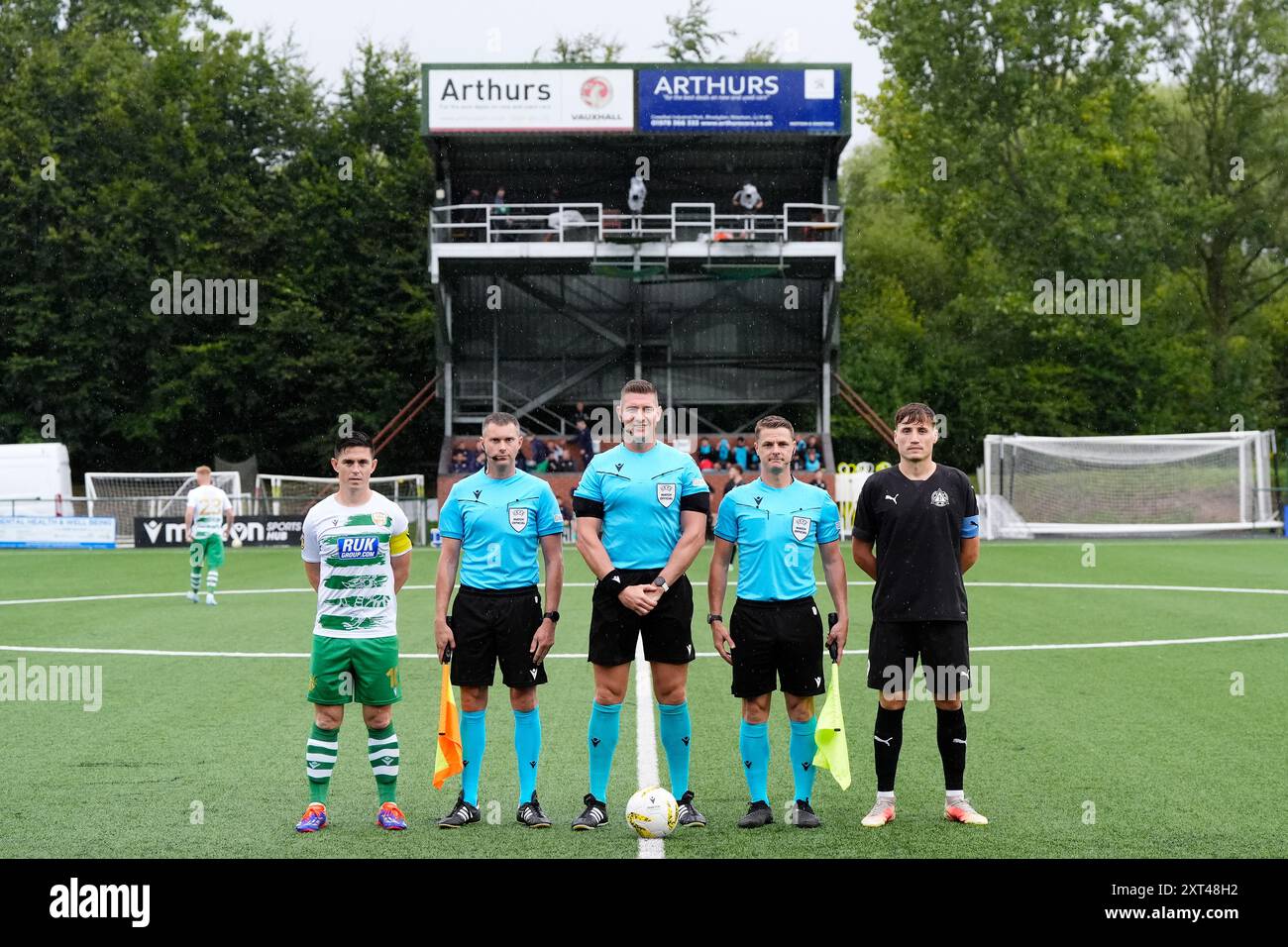(Left to right) The New Saints' Danny Redmond, assistant referee Simon ...