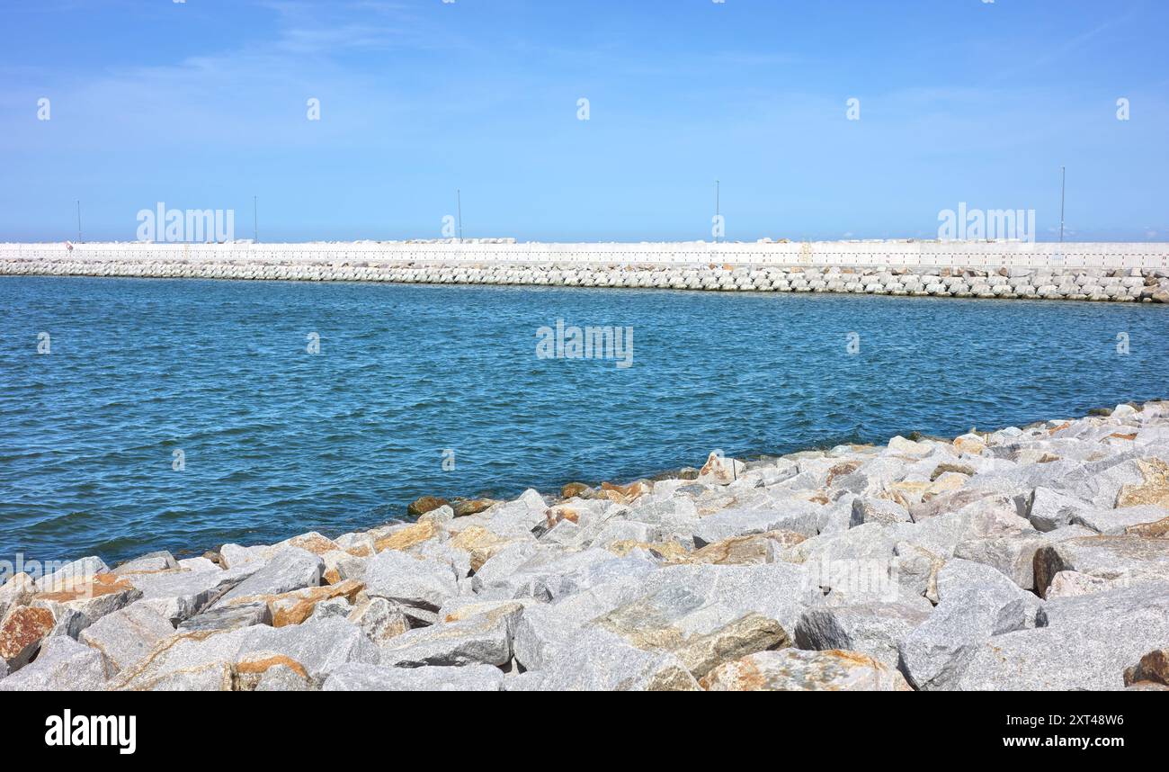 Sea breakwater and rock embankment Stock Photo - Alamy