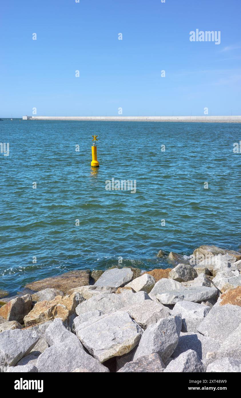 Sea breakwater and rock embankment Stock Photo - Alamy