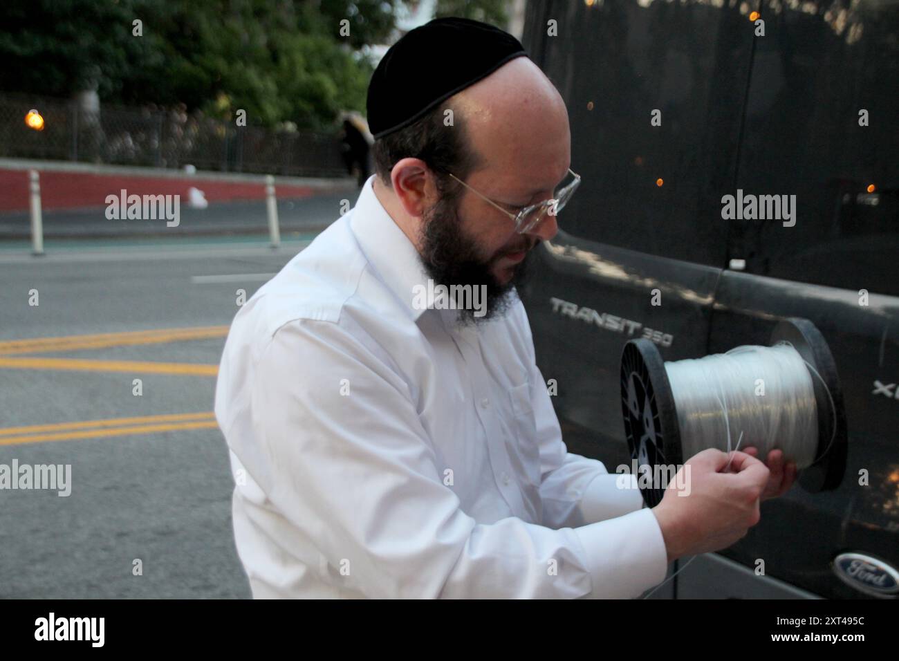New York, USA. 20th June, 2024. Rabbi Moshe Tauber shows the fishing ...