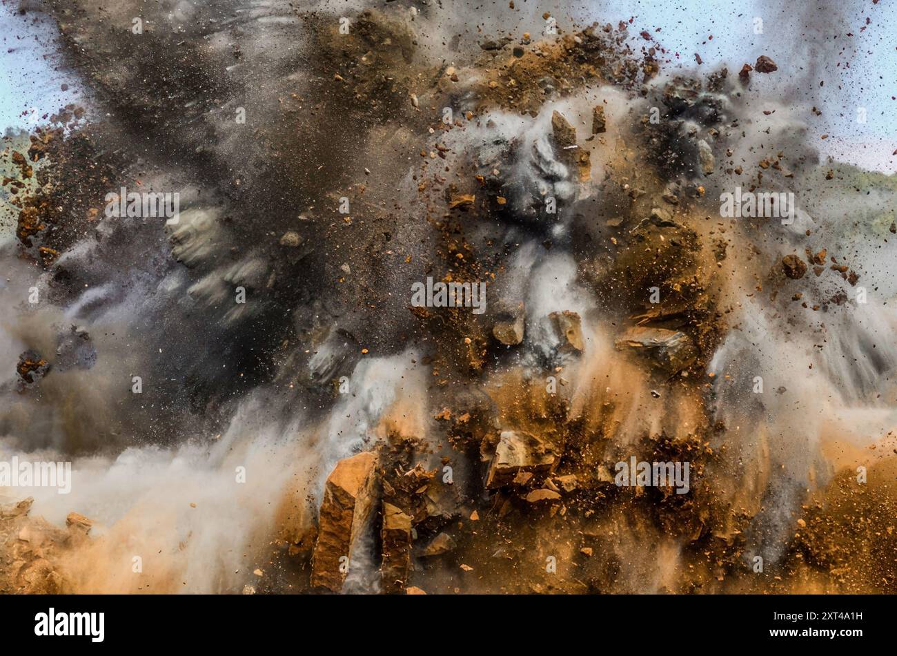 Dust storm after detonator blasting on the open pit mining site Stock ...