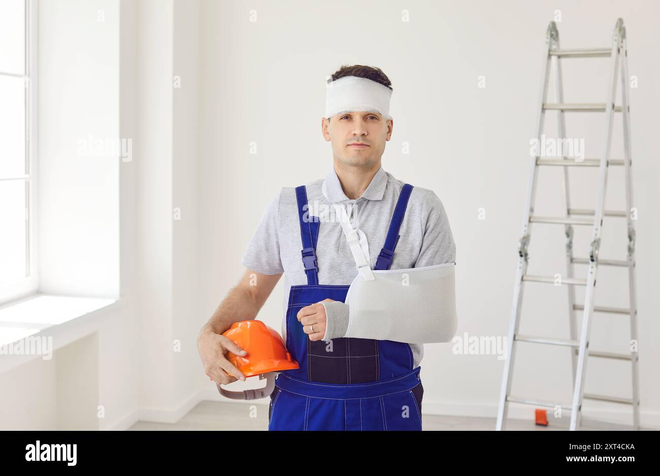 Portrait of builder who got arm fracture and head injury during ...