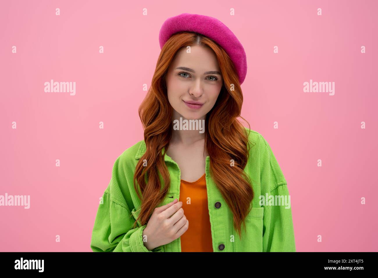 Pretty young confident woman in pink beret and bright clothes Stock ...