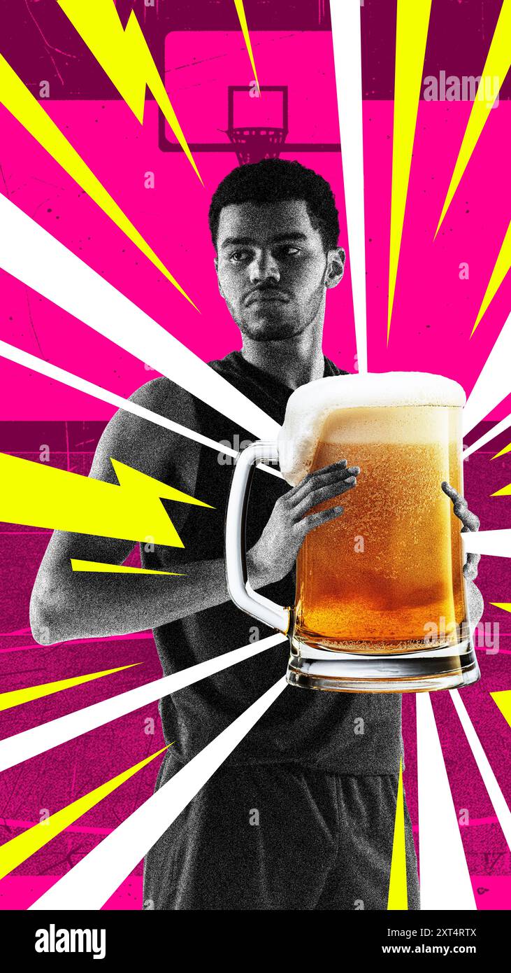 Muscular man, basketball player standing with giant lager beer mug ...