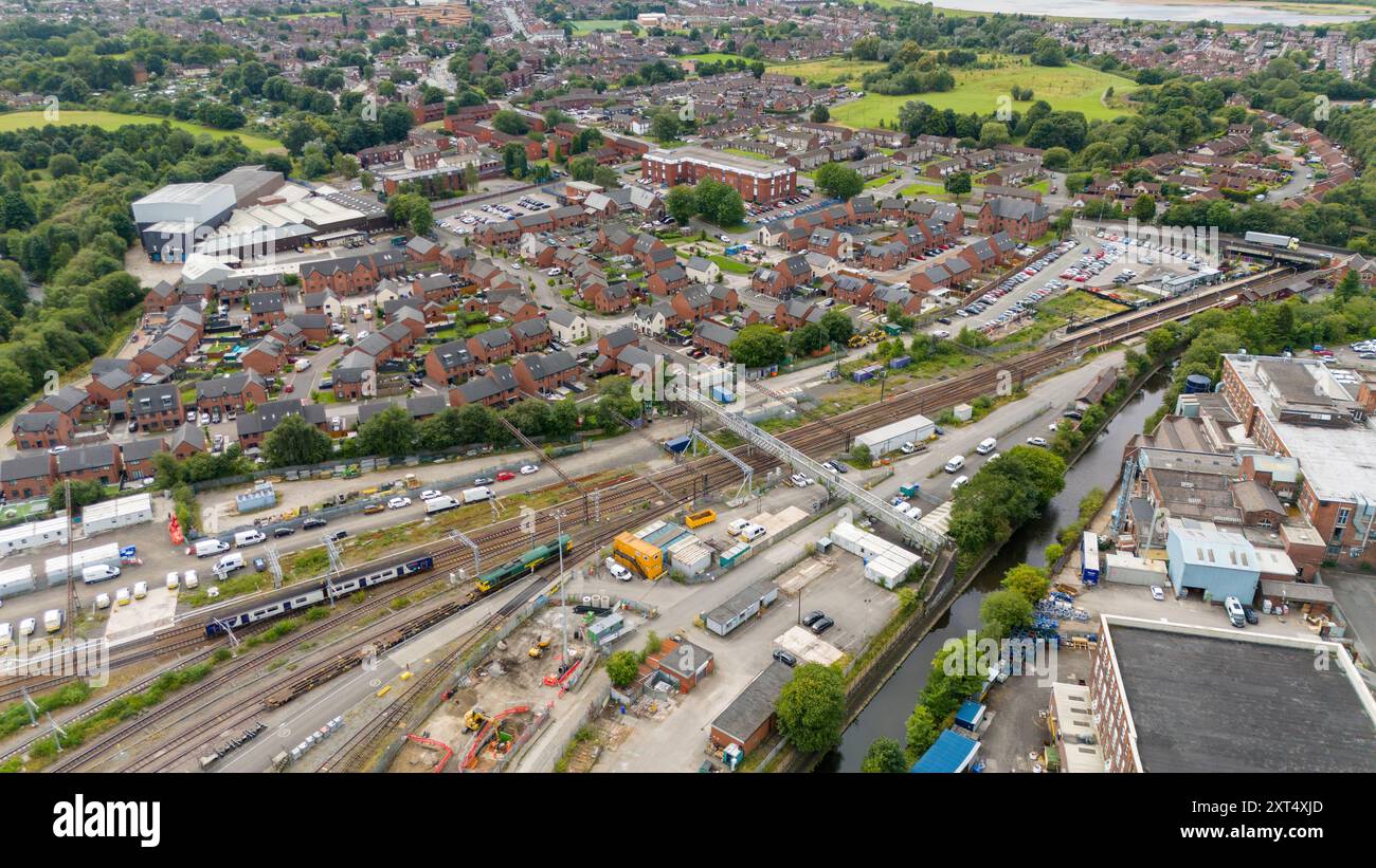Aerial, Tameside, Guide Bridge railway station and freight sidings ...