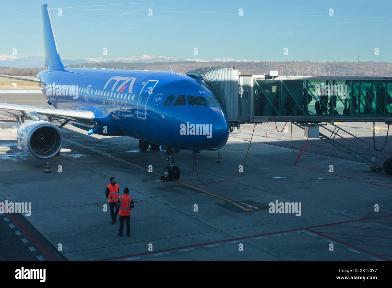 Trieste - December 18, 2023: Passengers walking through the passenger ...