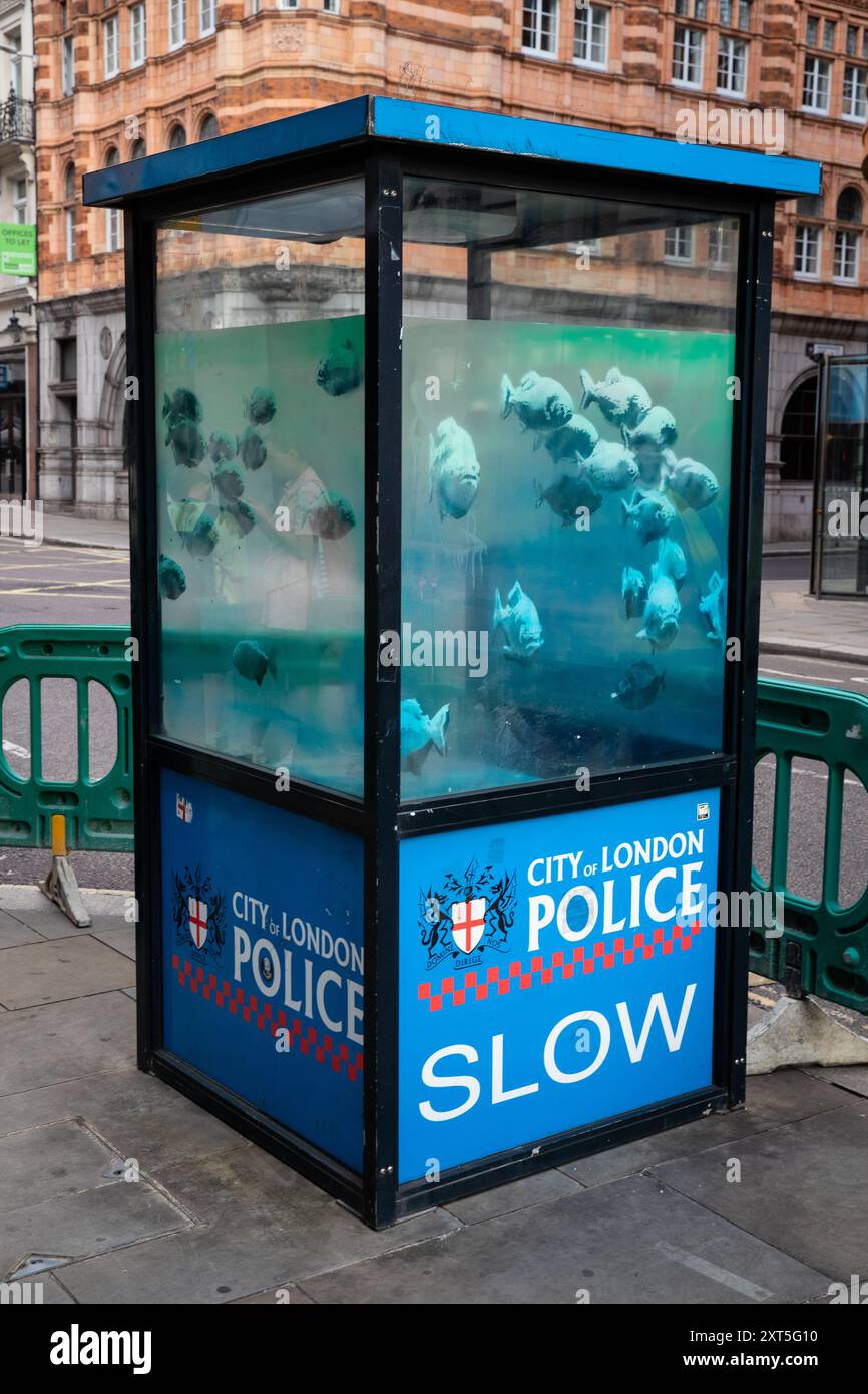 Banksy's artwork on a police box in Ludgate Hill, London Stock Photo ...