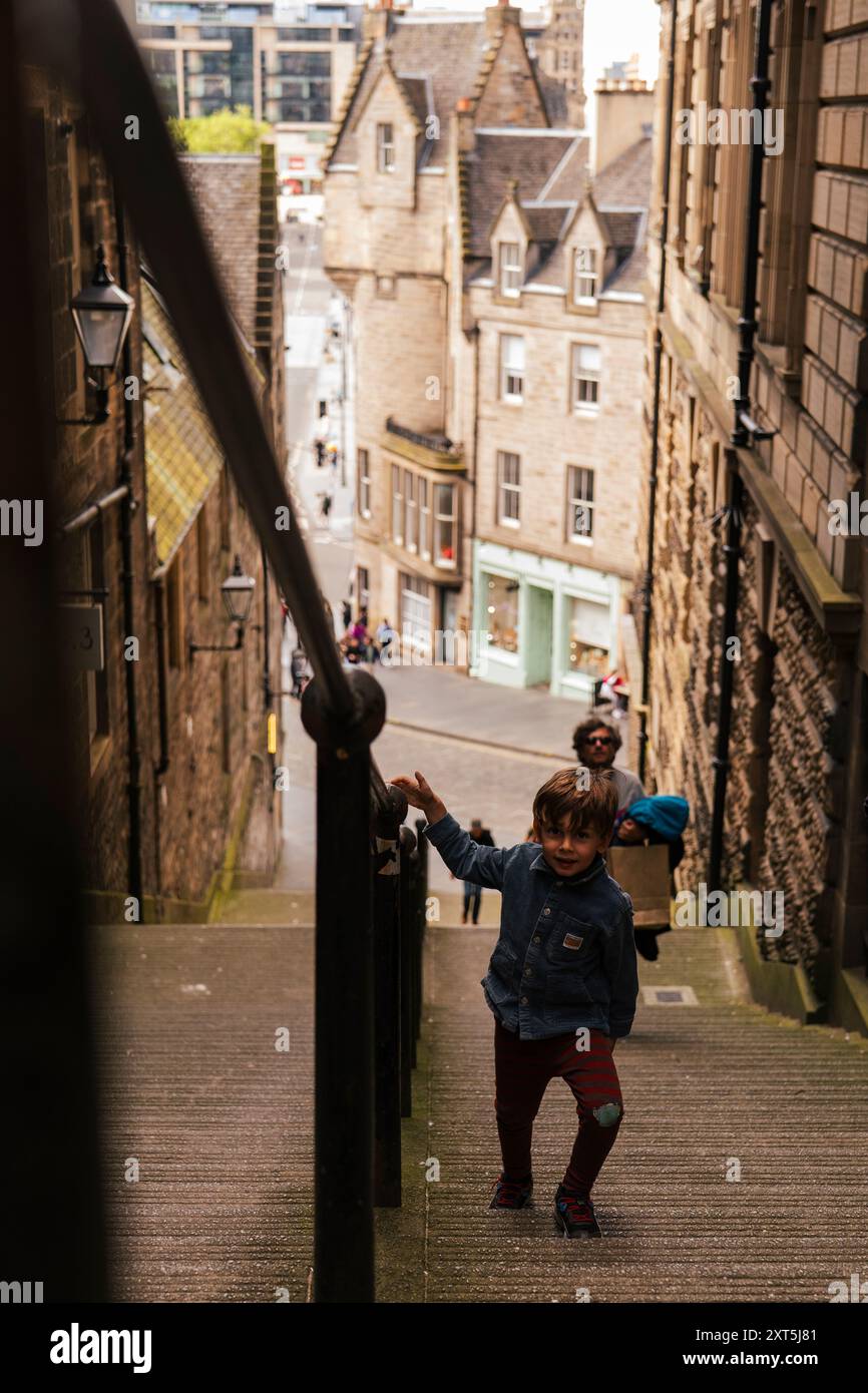 Tourists in Edinburgh taking in views, posing for photos, takin in the ...