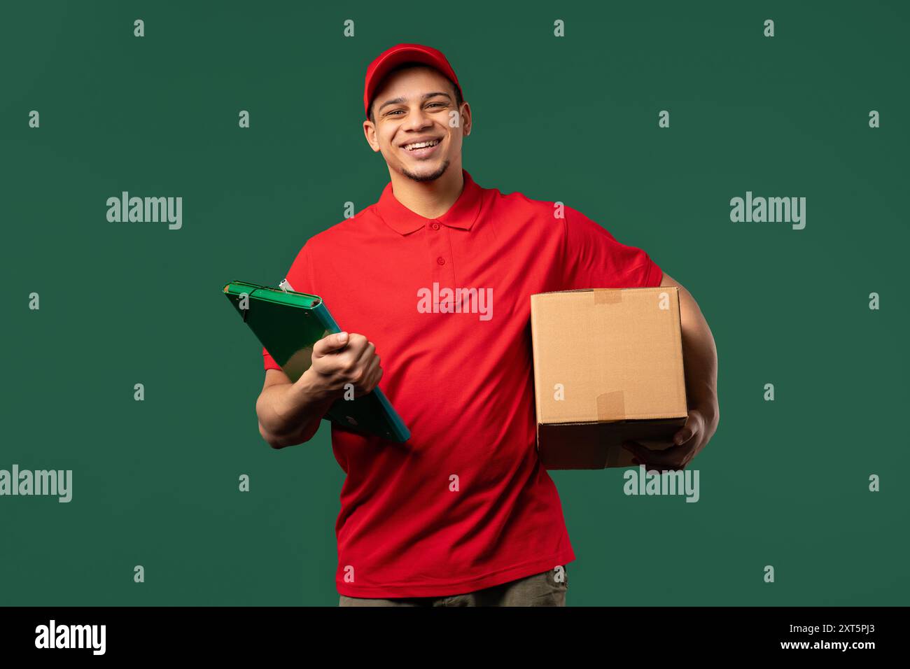Positive postal courier man with parcel box. Happy postman delivers ...