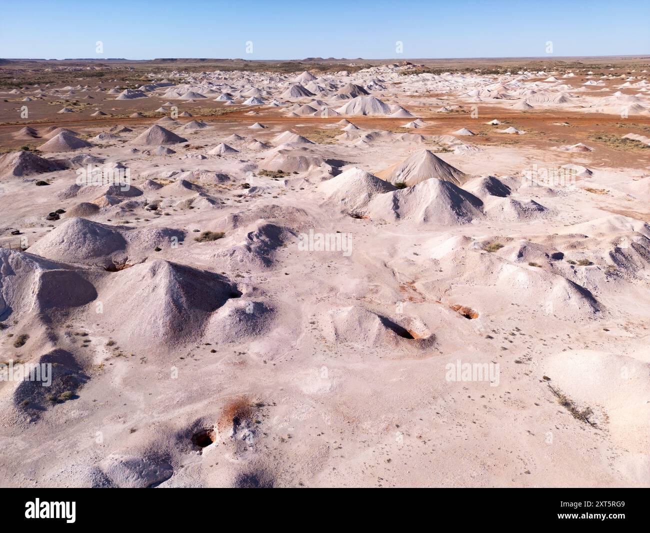 Mullock, or waste, piles brought up from underground by opal miners ...
