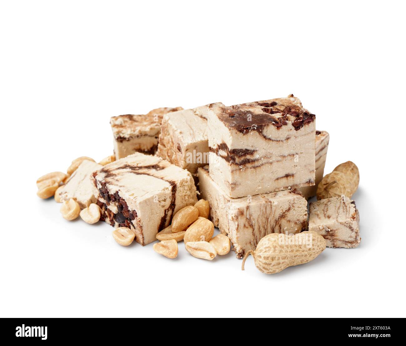 Pieces of tasty marble halva with peanuts on white background Stock Photo - Alamy