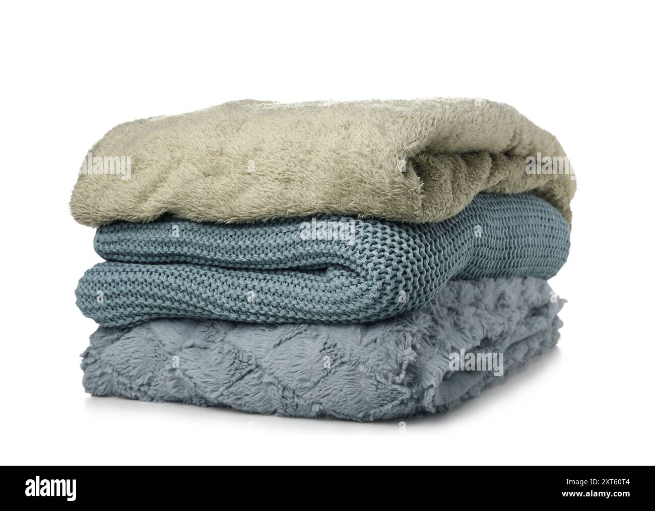 Different soft folded blankets on white background Stock Photo - Alamy