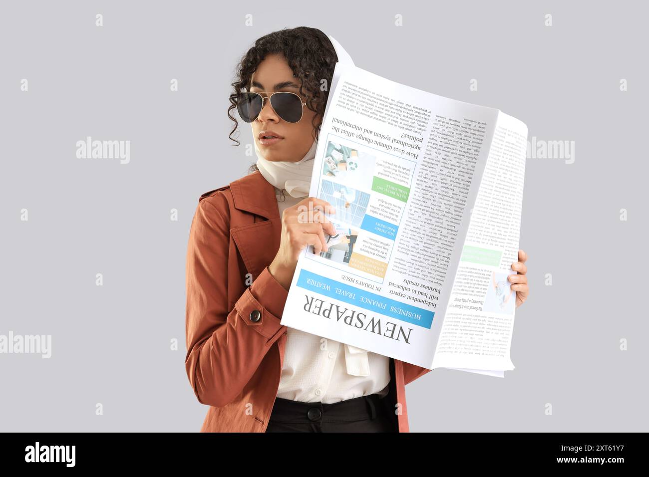 Studying newspaper young hi-res stock photography and images - Alamy